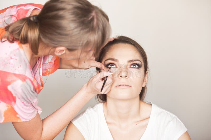 Make Up Artist Doing Makeup for Model Stock Photo - Image of ...