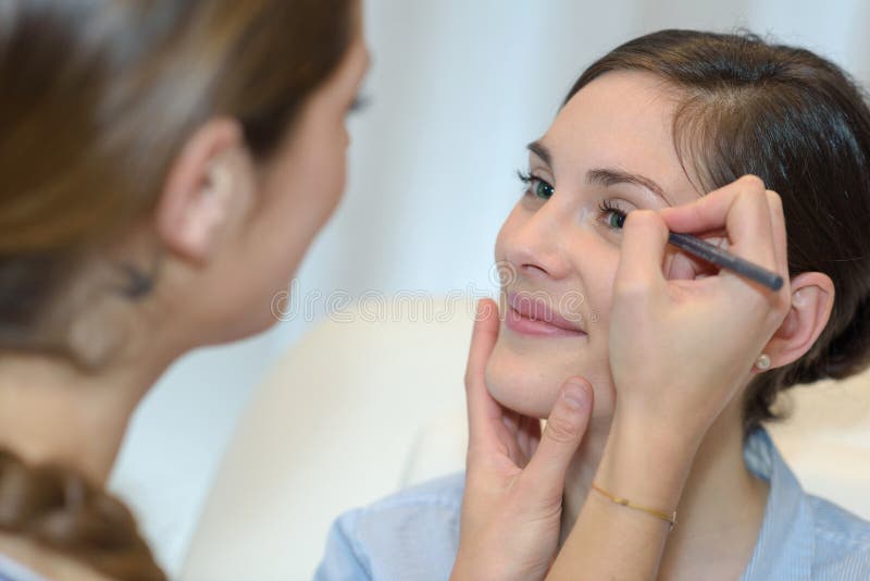 Make-up Artist Doing Make Up for Young Beautiful Bride Stock Image ...