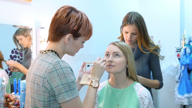 Make-up Artist and Stylist Doing Makeup Model for Photography Stock ...