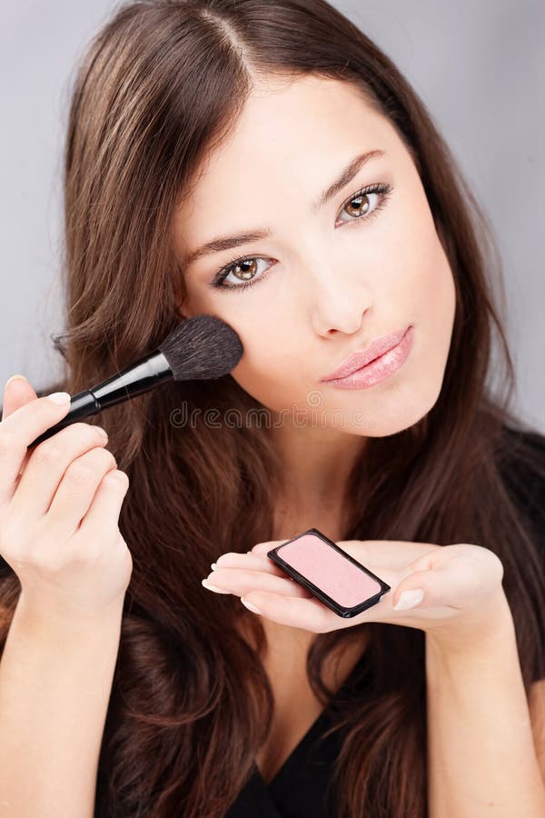 Make up with powder brush stock image. Image of beauty - 26850357