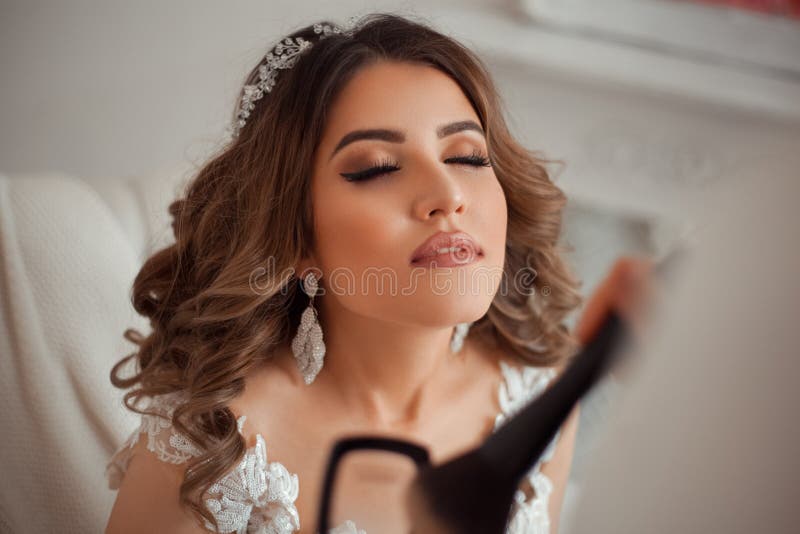 Make-up Process, Makeup Artist Using a Brush and Compact Powder. Stock ...