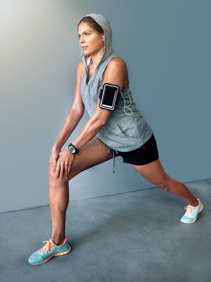 Make Your Muscles Work for You. a Fit Young Woman Lunging during Her ...