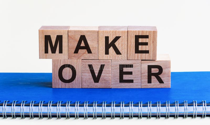 MAKEOVER - a Word Made of Wooden Blocks with Black Letters, a Row of ...