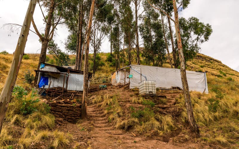 Makeshift Hillside Shelters with Water Tank Stock Photo - Image of ...