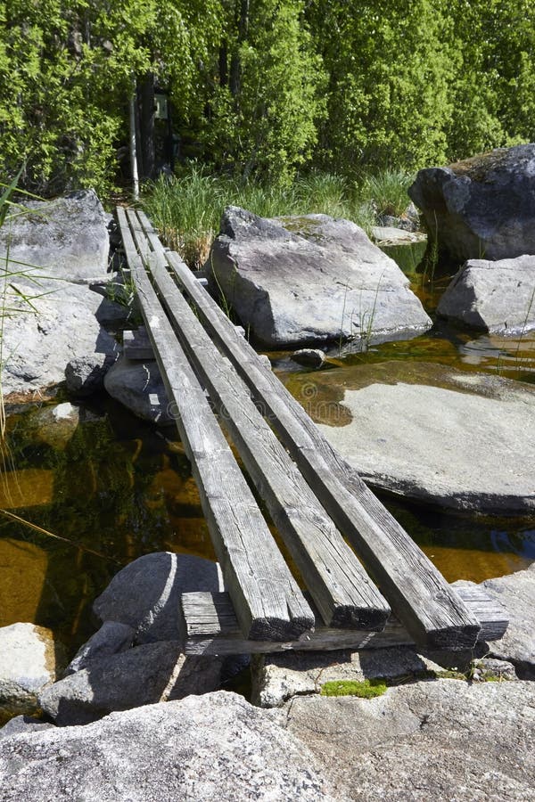 Makeshift Wooden Bridge Over Water Stock Photo - Image of outdoors ...