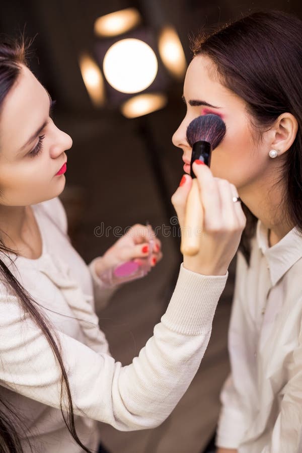 Makeup artist apply makeup stock image. Image of fashion - 68962003