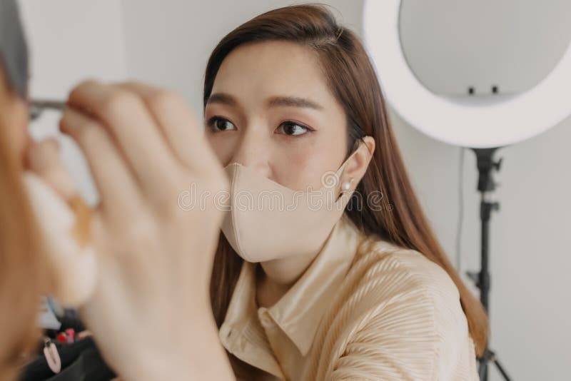 Makeup Artist is Applying Makeup on Client Eyes. Stock Image - Image of ...
