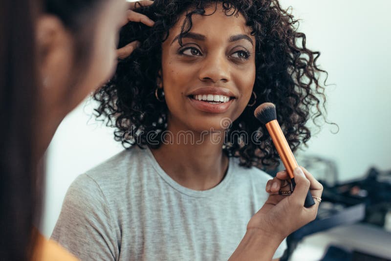 Makeup Artist Applying Makeup To a Model Stock Photo - Image of close ...