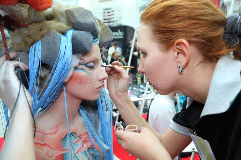 Makeup Artist Makes Body Art for Model Editorial Photo - Image of ...
