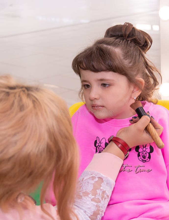 A Makeup Artist Makes Makeup for a Child Editorial Photo - Image of ...