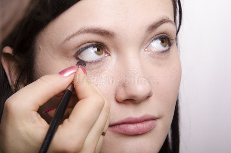 Makeup Artist in the Process of Makeup Colors Eyelashes Model Stock ...