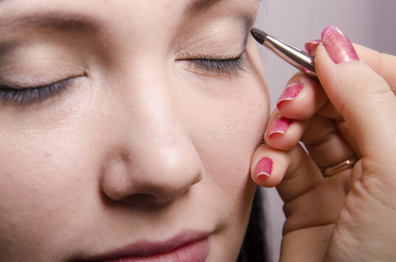 Makeup Artist in the Process of Makeup Colors Upper Eyelids Model Stock ...