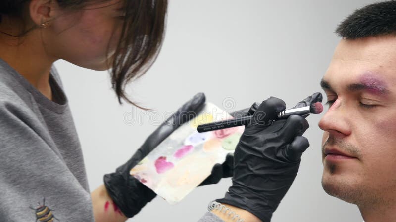 Makeup Artist at Work Applying Special Effects Makeup Stock Video ...