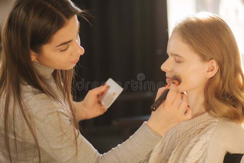 Makeup Artist Work with Model in Beauty Studio. Start Working. Model ...