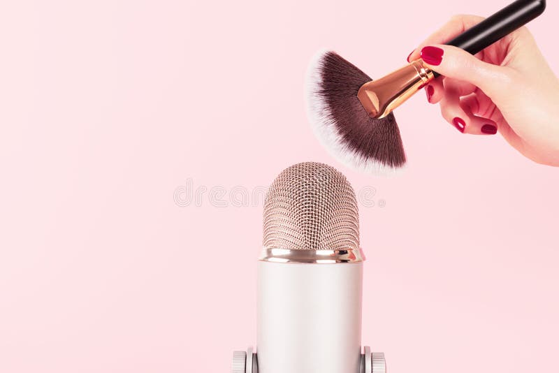 A Microphone on Pink Background Decorated with Confetti. Minimal ...