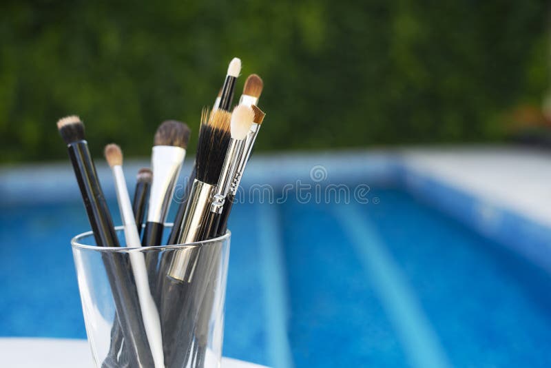 Makeup Brushes on a Background of a Swimming Pool Stock Image - Image ...