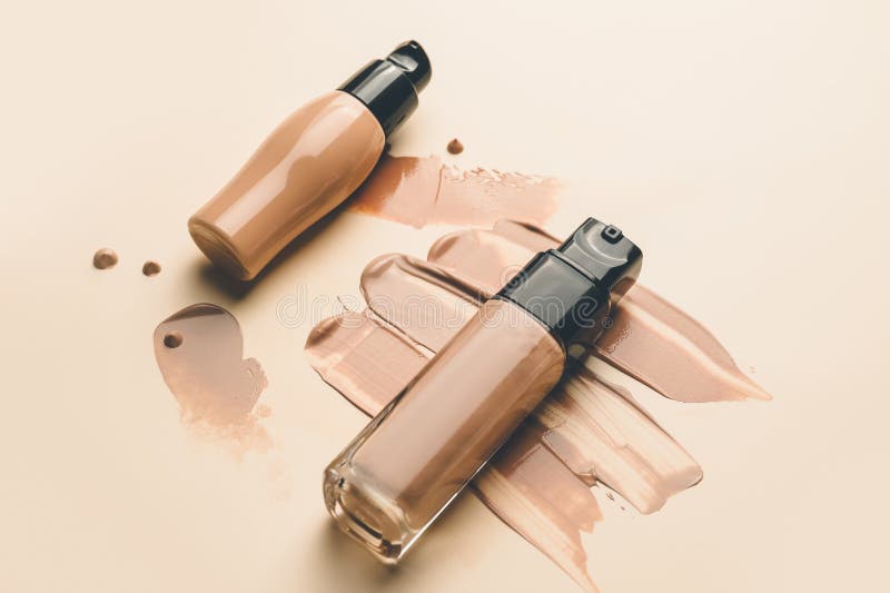 Bottles of Makeup Foundation and Samples on Color Background Stock ...