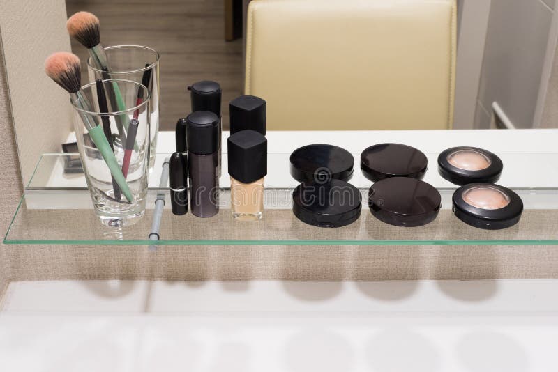 Makeup Kits in Front of Mirror with Empty Chair Stock Photo - Image of ...