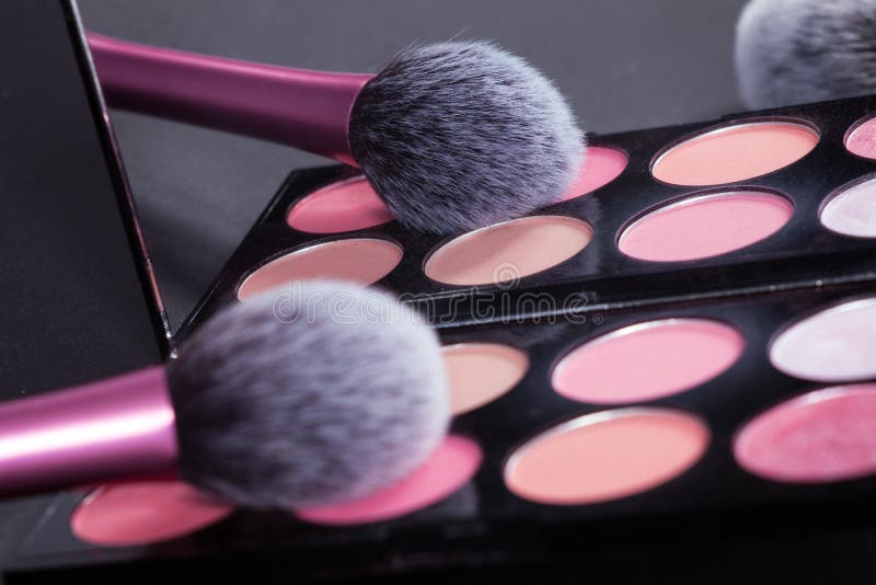 Makeup Palette and Brush Reflect in Mirror. Stock Image - Image of ...