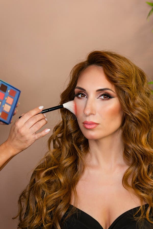 Makeup preparation process stock photo. Image of model - 217017726