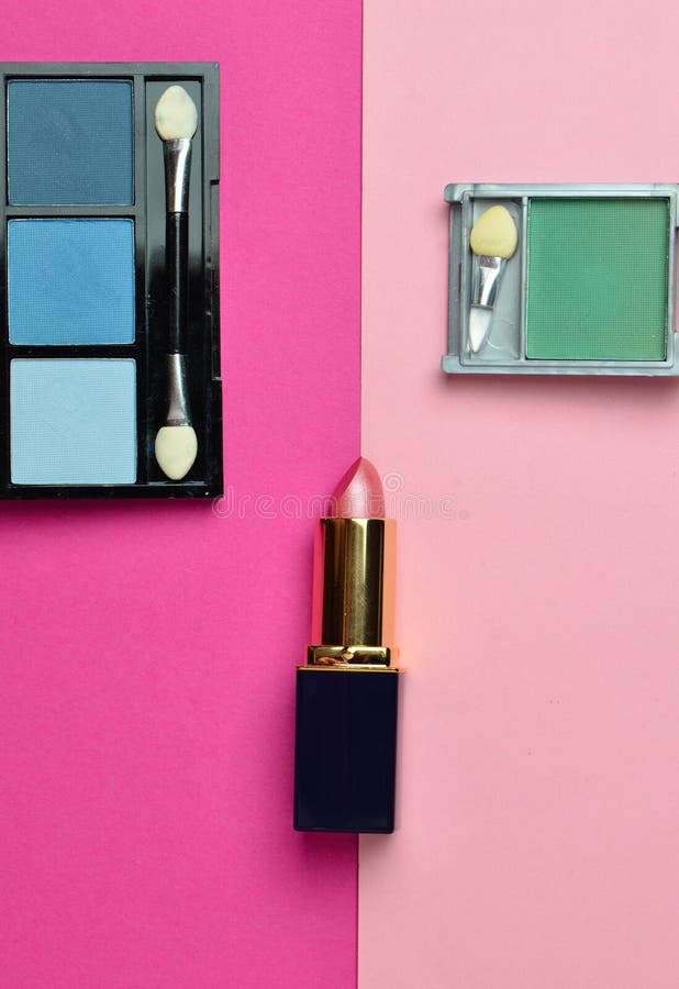 Makeup Shadows and Lipstick on a Multi-colored Pink Background Stock ...