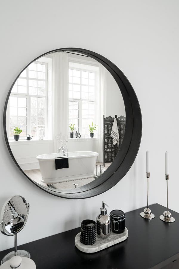 Makeup Table and Round Mirror in Contemporary Bathroom Stock Image ...