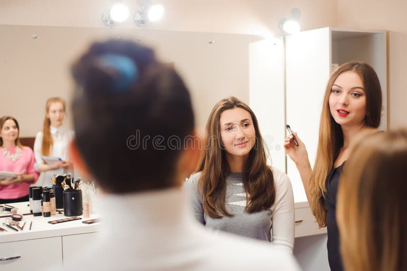 Makeup Teacher with Her Student Girls. Makeup Tutorial Lesson Stock ...