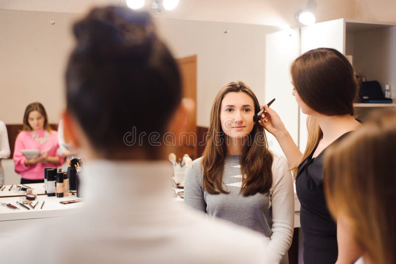 Makeup Teacher with Her Student Girls. Makeup Tutorial Lesson at Beauty ...