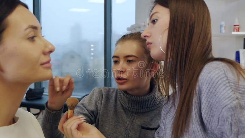 Makeup Teacher with His Student. Make-up Lesson at Beauty School ...