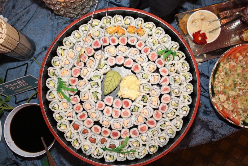 Variety of Maki Rolls in Round Display Stock Photo - Image of bowl ...