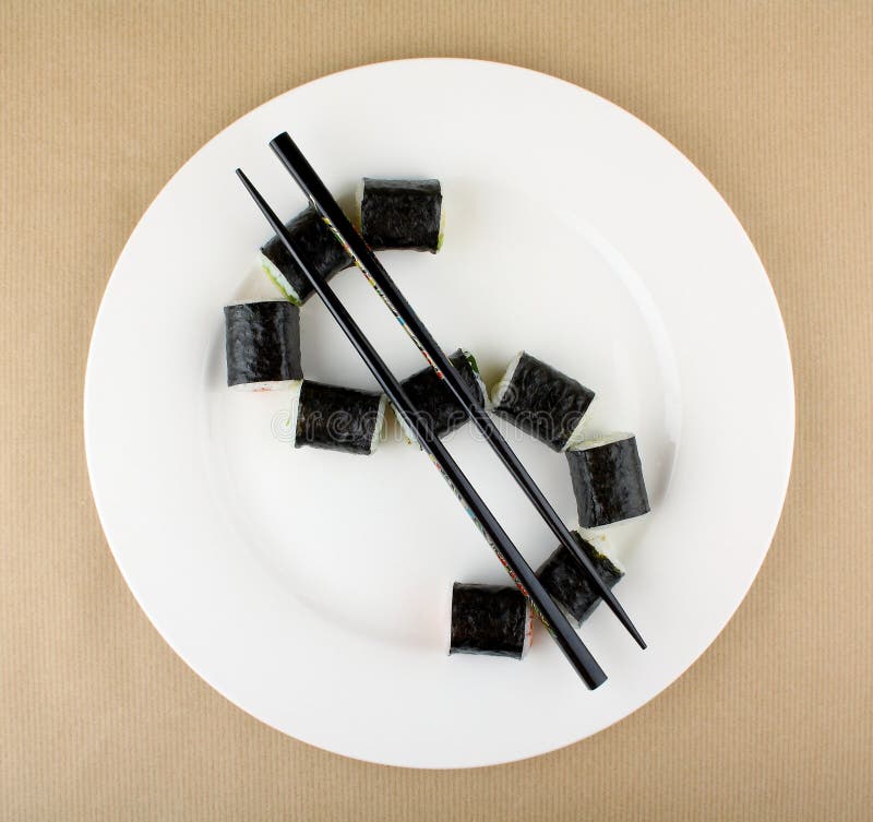 Maki Sushi As Dollar Sign on White Plate, Close Up Stock Photo - Image ...
