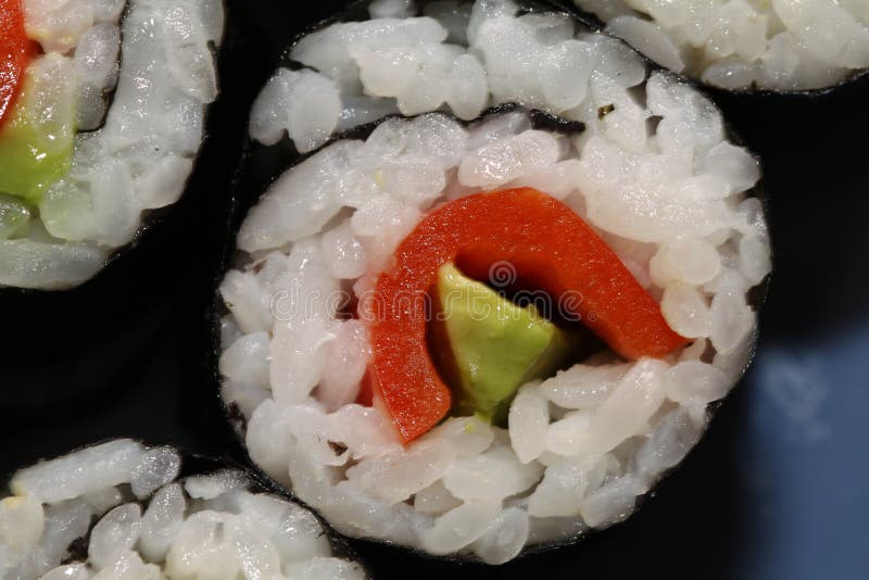 Maki Sushi Roll Rice with Red Peppers and Avocado Stock Photo - Image ...