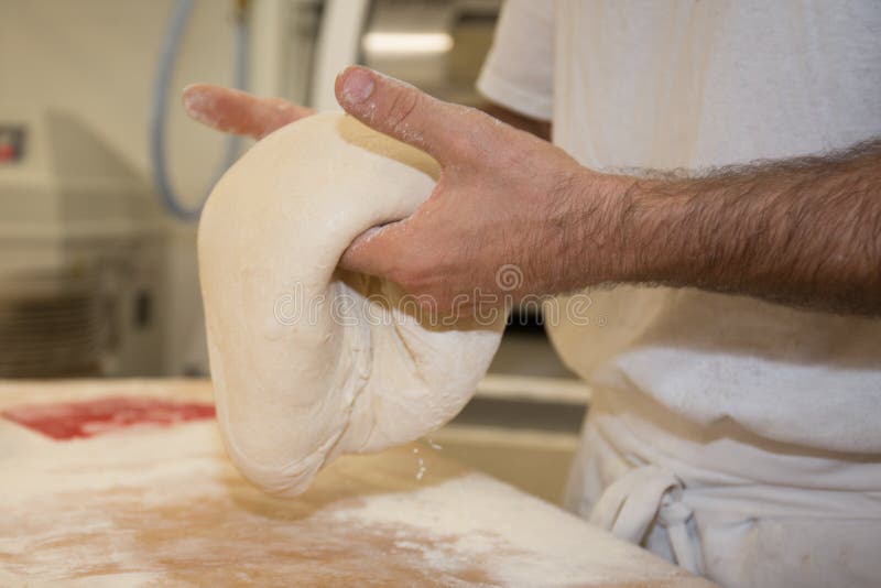Chief Baker Preparing Dough for Bread in a Bakery. Kitchen Professional ...