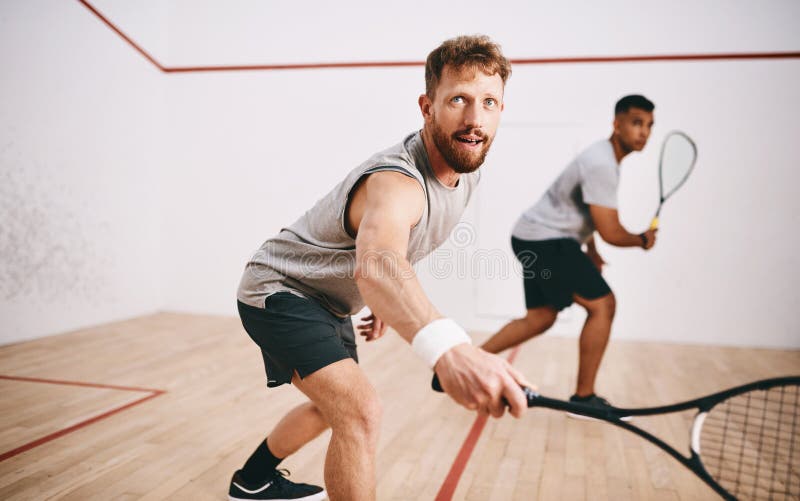 Making that Ball Mine. Two Young Men Playing a Game of Squash. Stock ...