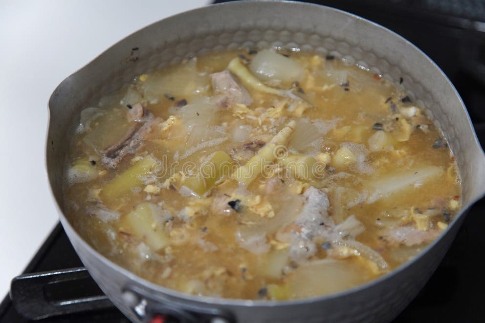 Making bamboo shoot soup stock image. Image of onions - 343579149