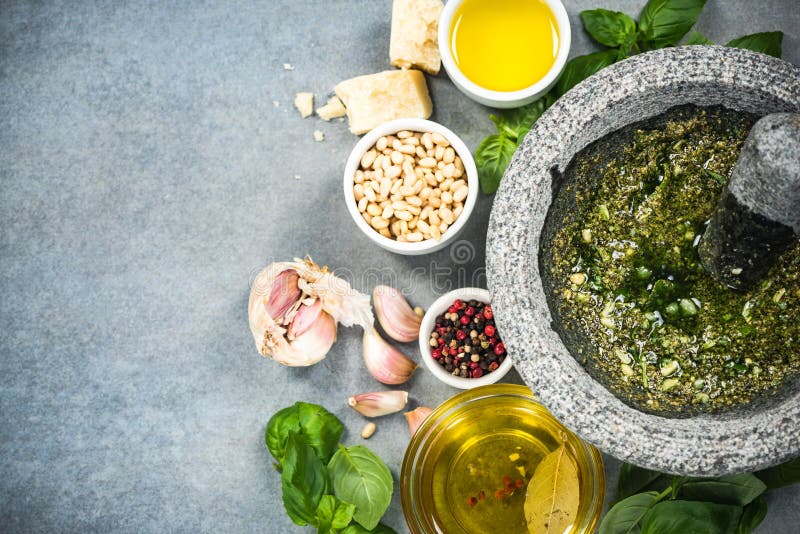 Making basil pesto at home stock image. Image of kitchen - 136209673
