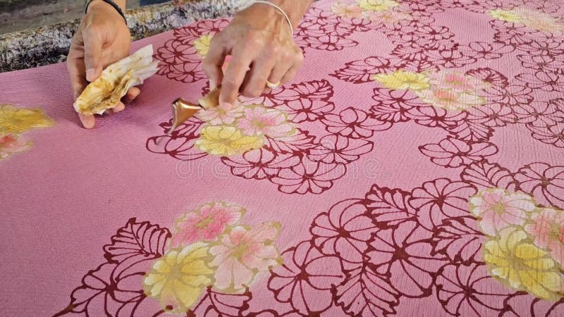 Making Batik by Drawing Beautiful Patterns by Hand. Stock Footage ...