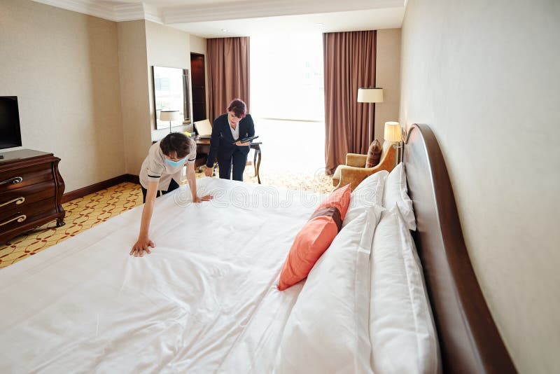 Making Bed Under Managers Control Stock Photo - Image of clean ...