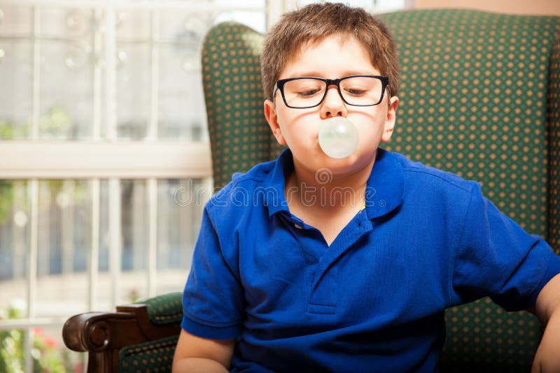 Making big bubble with gum stock image. Image of hispanic - 51314965