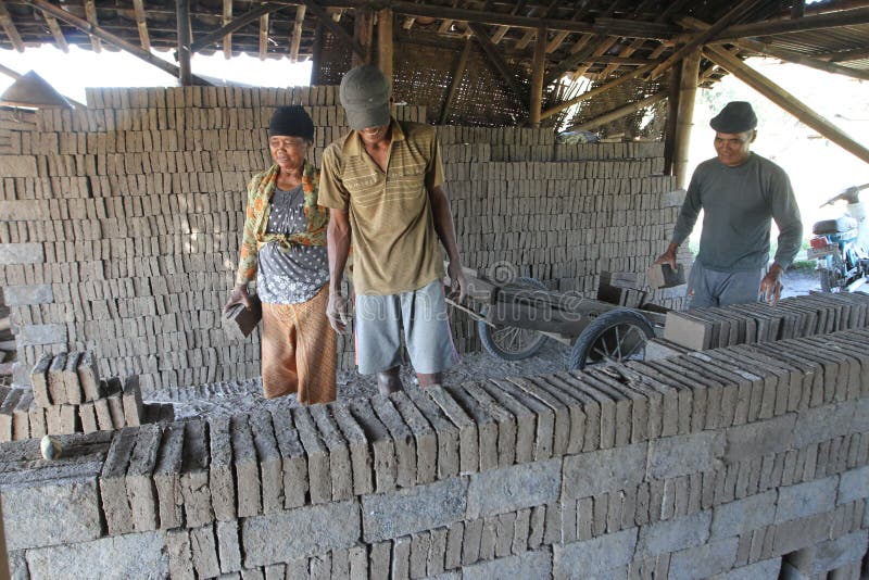Making bricks from clay editorial stock image. Image of making - 31523374