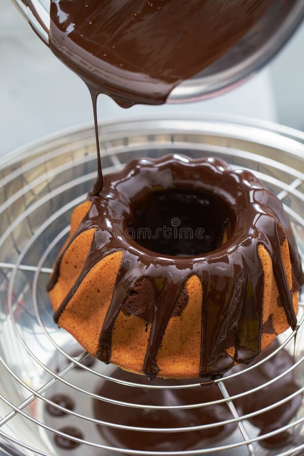 Making a Cake, Pouring Chocolate on Chiffon Bread Stock Image - Image ...
