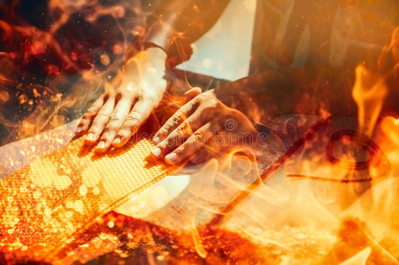 Making Candle from Honey Bee Wax Plate at Market. Fire Effect. Stock ...