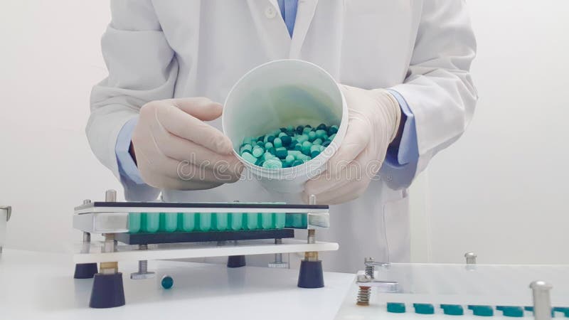 Capsule making machine stock photo. Image of treatment - 143727642