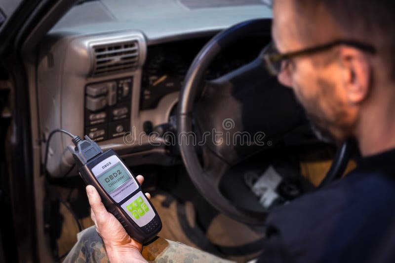 Making Car Diagnostics Using Obd Device Stock Photo - Image of people ...