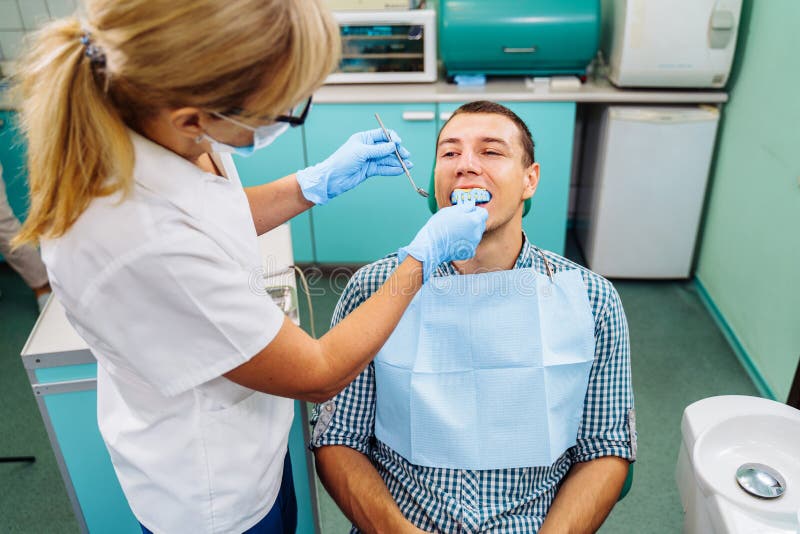Making Cast of the Upper Row of Teeth Using a Special Plate and Soft ...