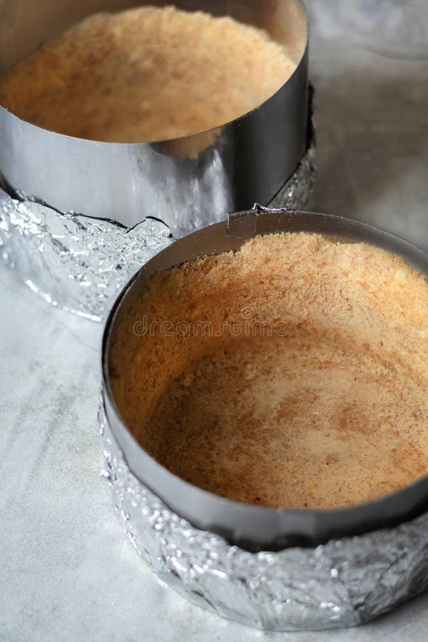 Making Cheesecake in a Baking Form in the Kitchen Cookie Layer in Shape ...