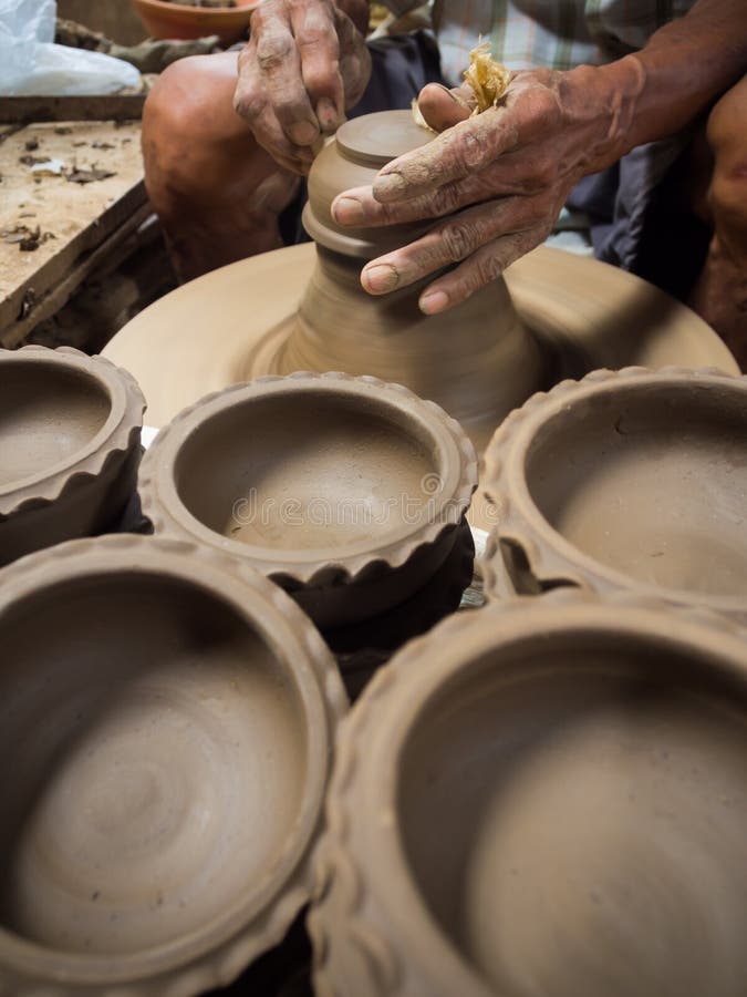 Making clay pot stock image. Image of ceramic, manufacturing - 49992311
