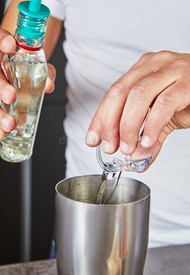 Making a Cocktail in Your Home Kitchen from Coffee Liqueur and Vodka ...