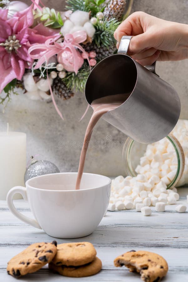 Making Cocoa on Christmas Background. the Composition of Hand Pours ...