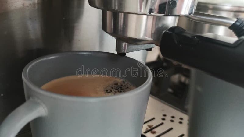 Making Coffee from a Coffee Machine into Two Grey Cups, Espresso Coffee ...